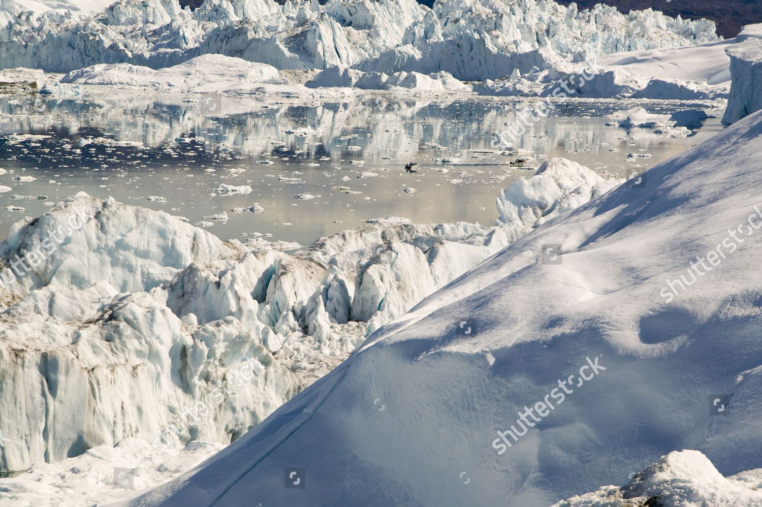 Inuit Fishing Boat Sails Through Icebergs Editorial Stock Photo - Stock ...