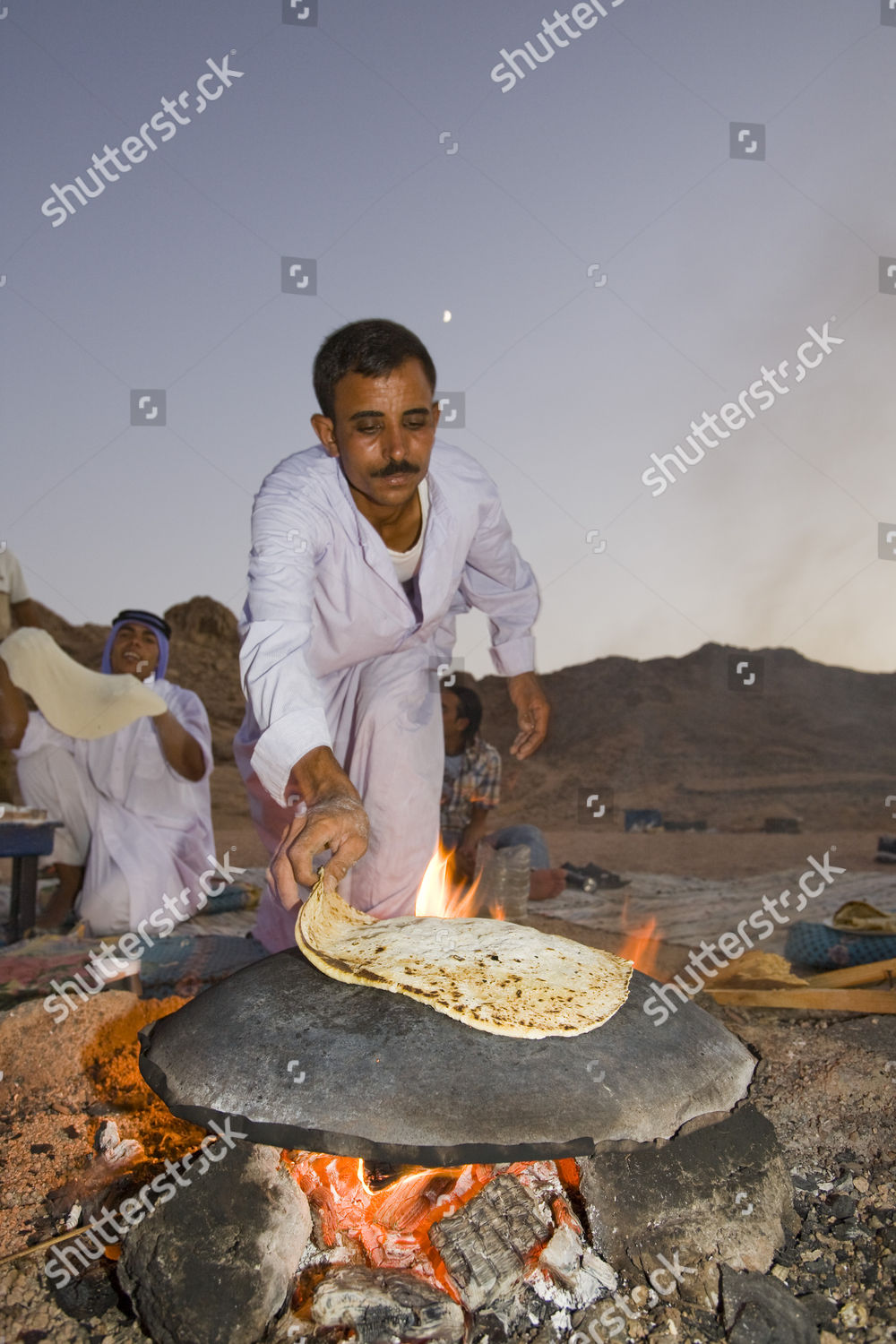 Bedouin Man Cooking Bread On Open Editorial Stock Photo - Stock Image ...