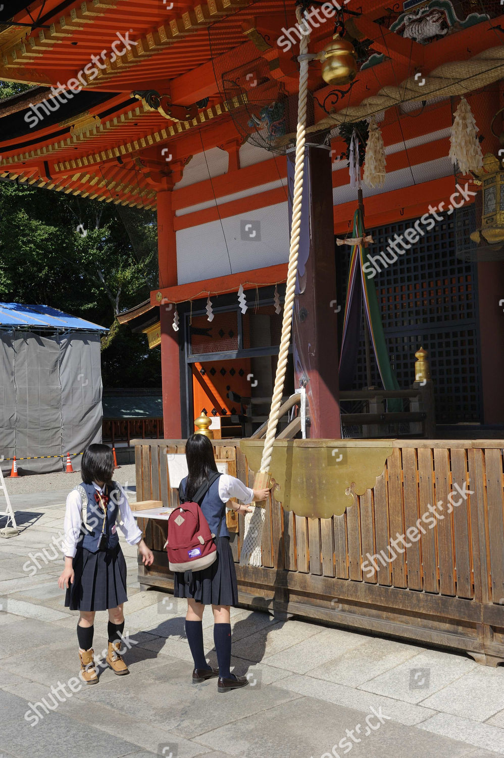 Students Wearing School Uniforms Ringing Bell Editorial Stock Photo ...