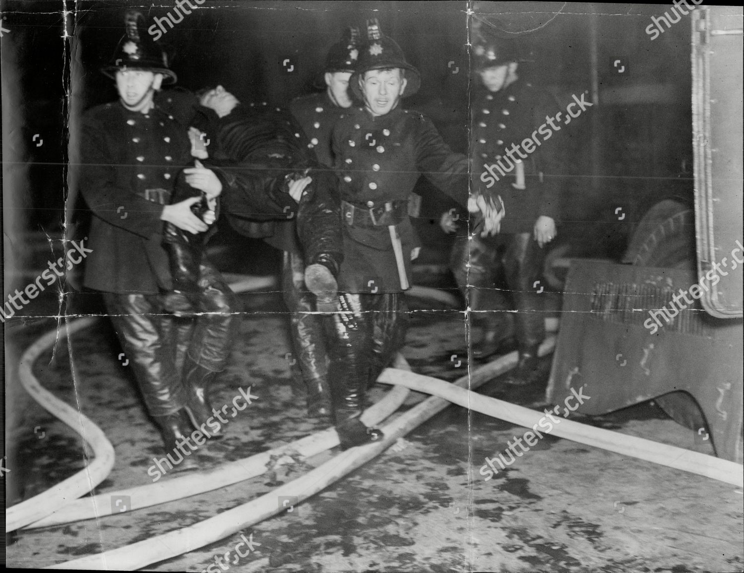 Firemen Overcome By Fumes After Fire Editorial Stock Photo - Stock ...