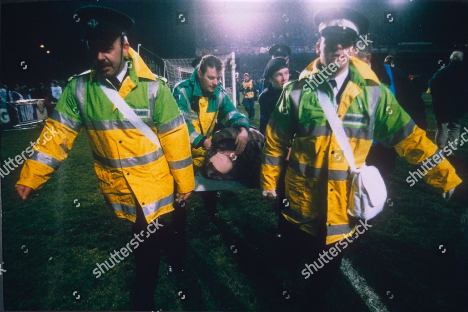 Rescue Workers Carrying Injured Person Away Editorial Stock Photo ...