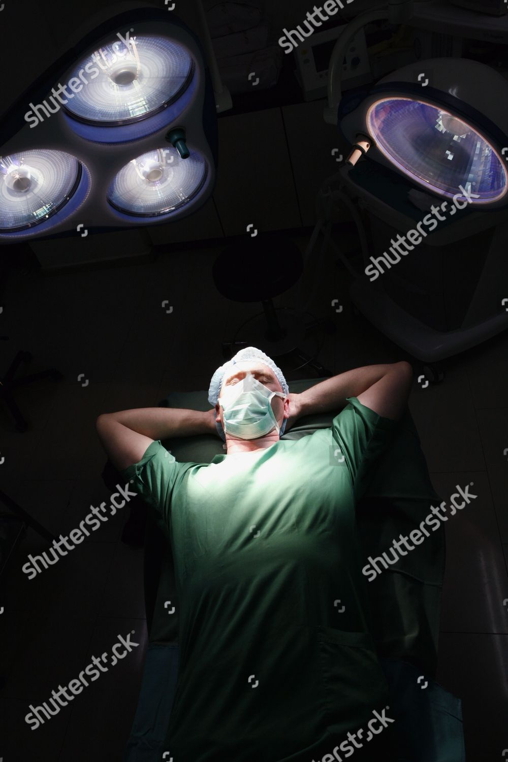 Tired Surgeon Sleeping On Operating Table Editorial Stock Photo - Stock ...