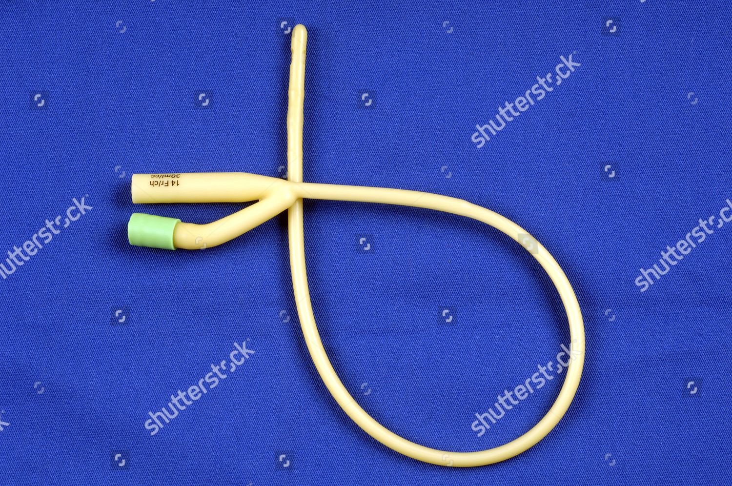 Paediatric Foley Catheter On Blue Table Editorial Stock Photo - Stock ...
