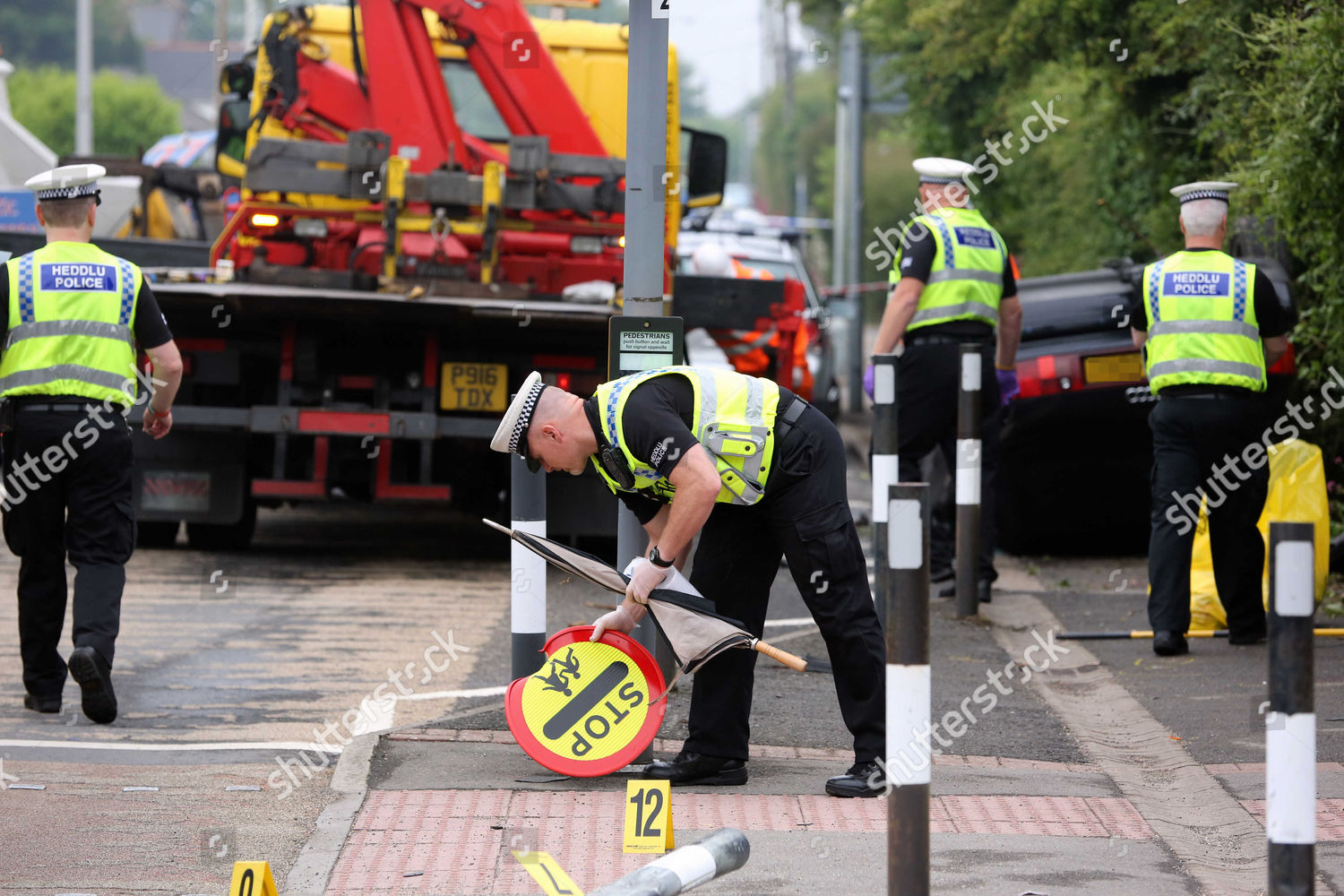 Police Officer Collects Damaged Stop Lollipop Editorial Stock Photo ...