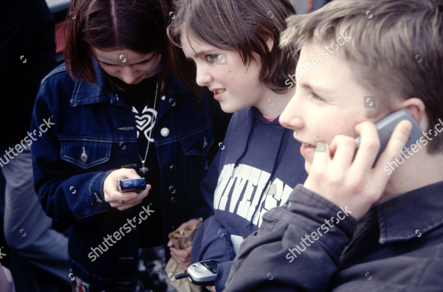 Teenagers Using Mobile Phones Editorial Stock Photo - Stock Image ...