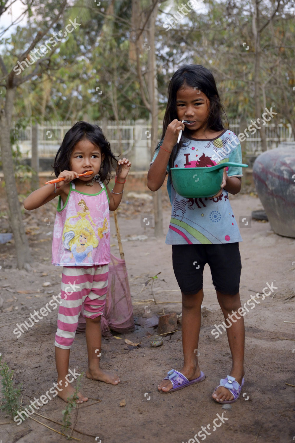 Two Girls Brushing Their Teeth Outside Editorial Stock Photo - Stock ...