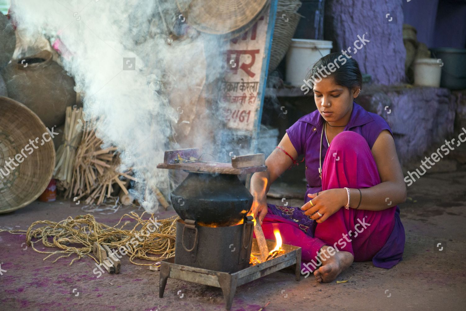 Young Indian Woman Squating On Ground Editorial Stock Photo - Stock ...