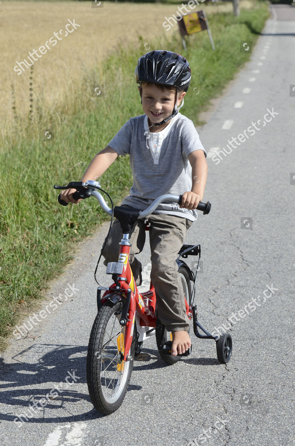 Model Released Boy Riding Bicycle Training Editorial Stock Photo ...