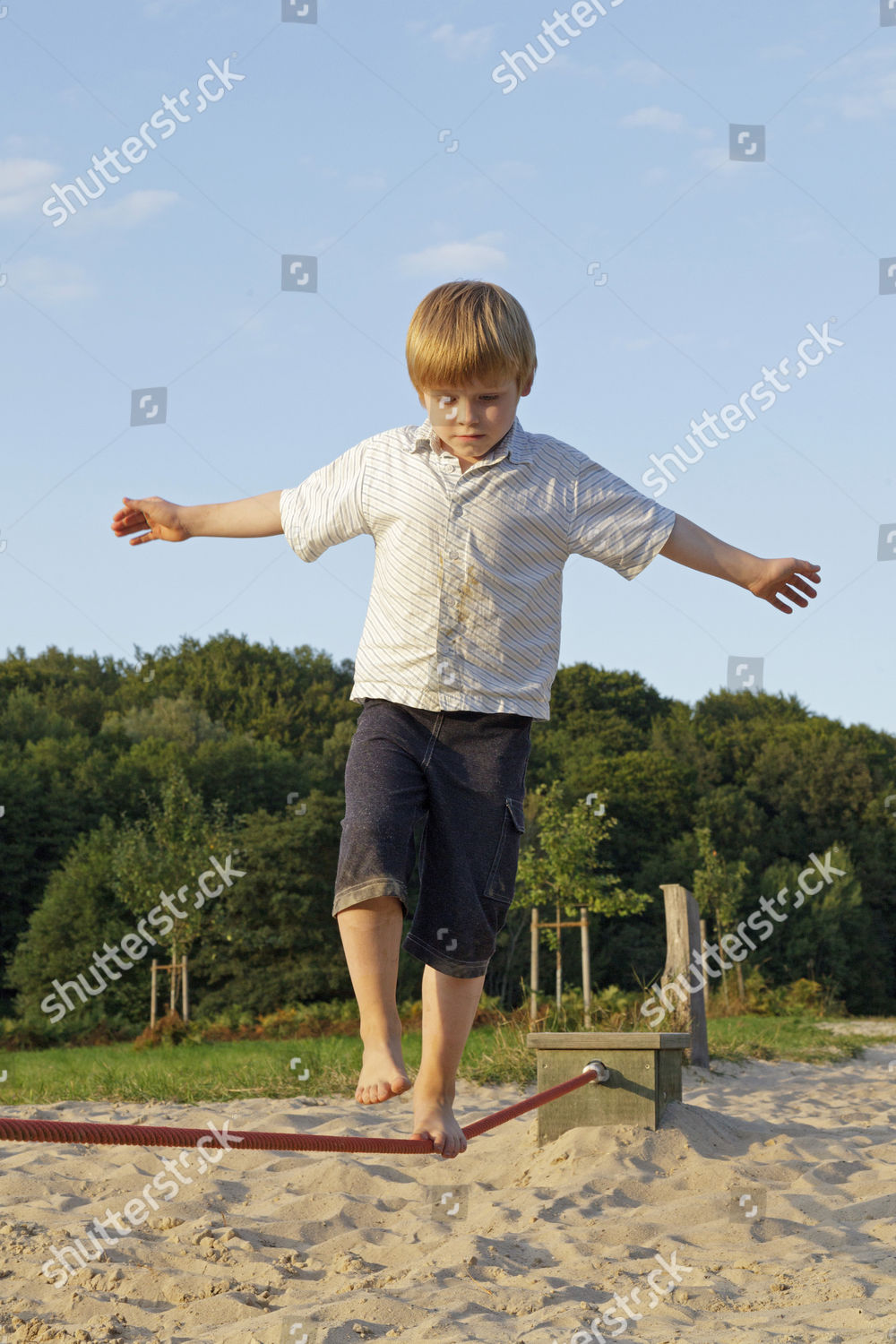 Model Released Young Boy Balancing On Editorial Stock Photo - Stock ...