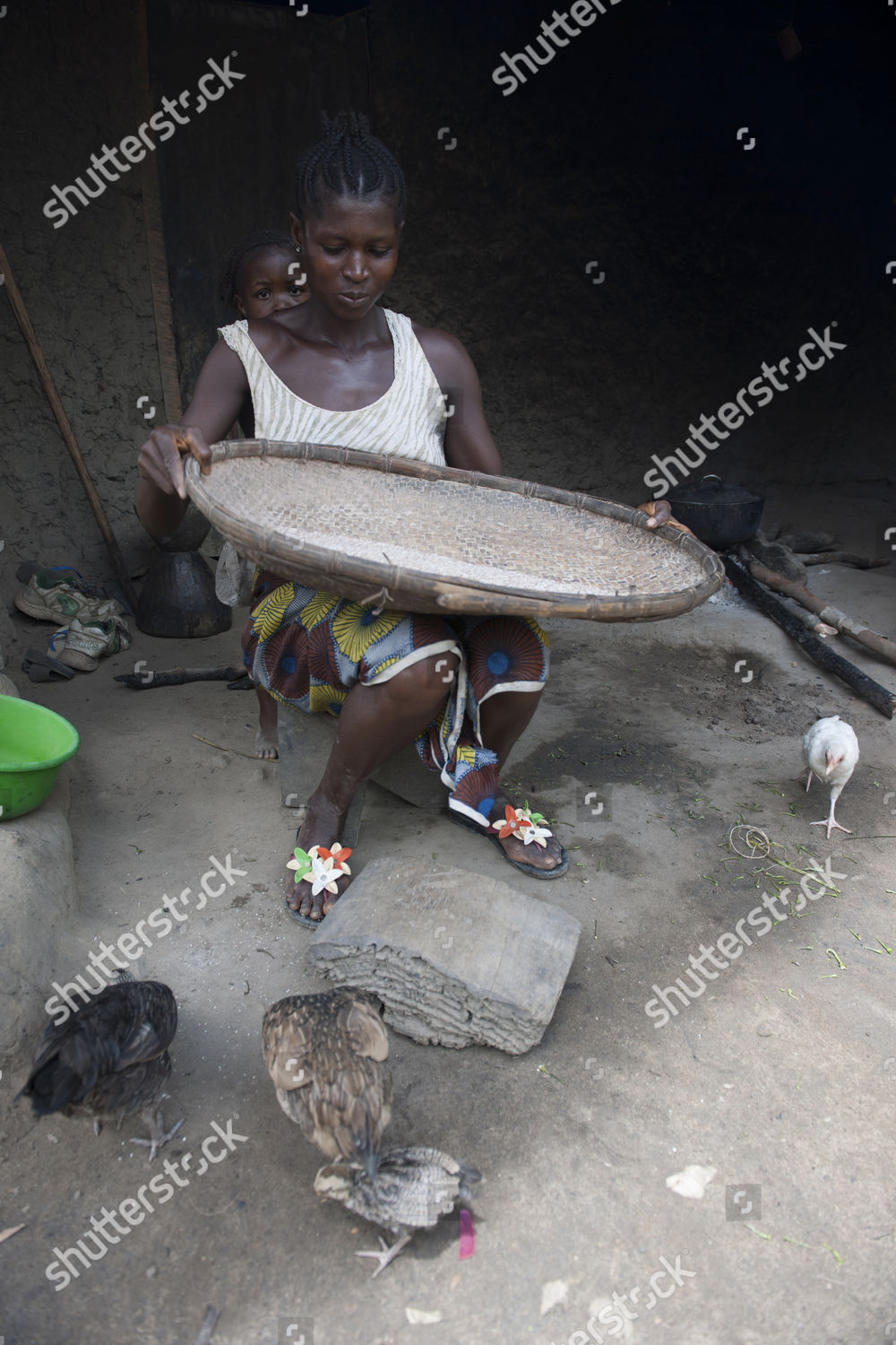 Woman Separating Grain Chaff Outside Hut Editorial Stock Photo - Stock ...