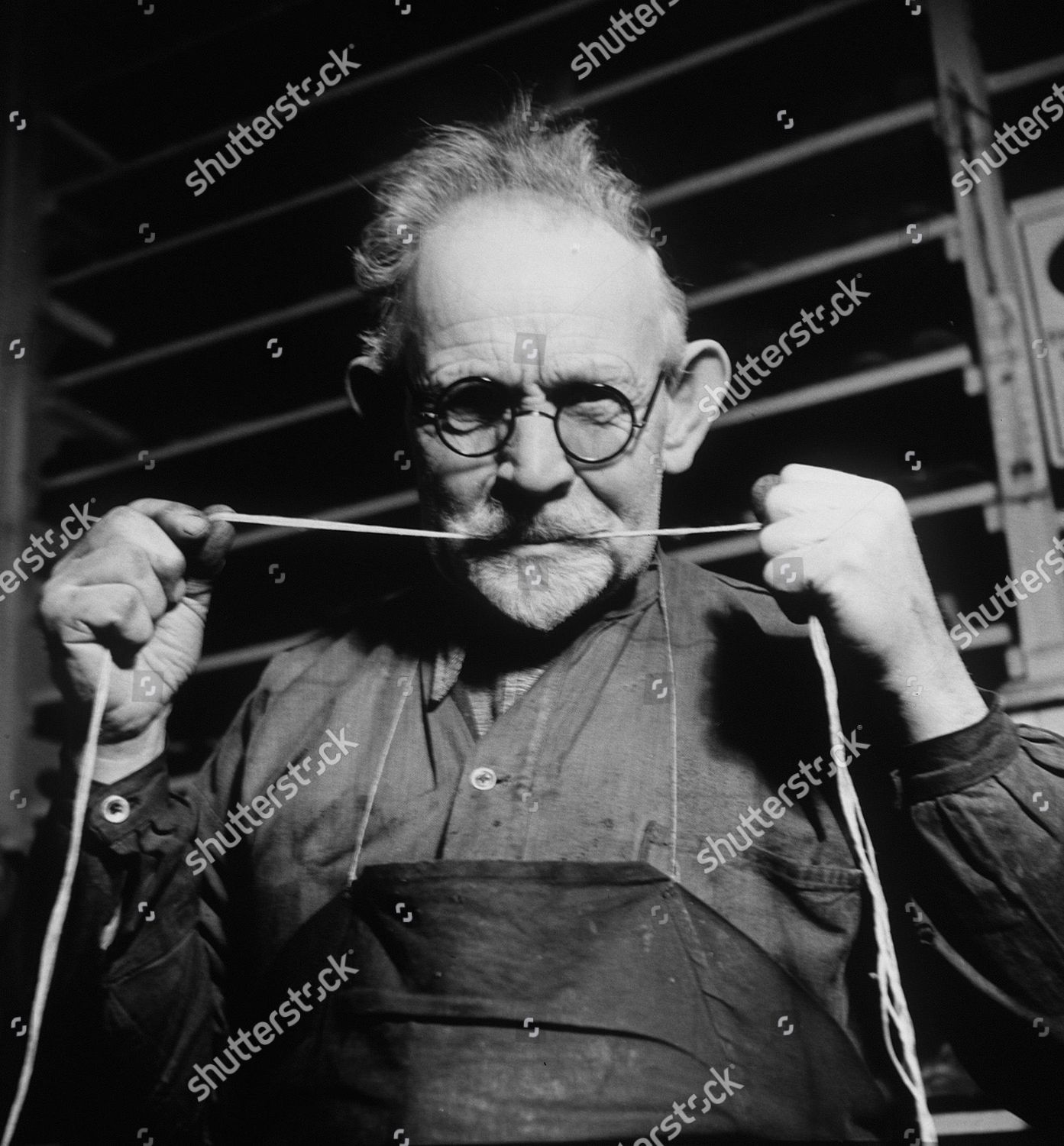 Old Man Biting String Editorial Stock Photo - Stock Image | Shutterstock