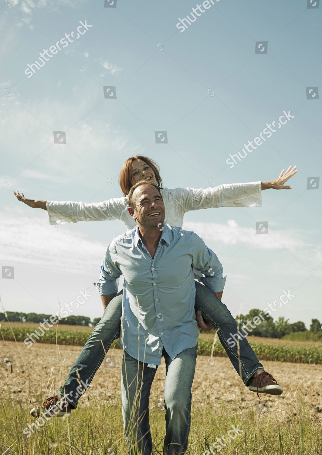 Model Released Man Giving Woman Piggyback Editorial Stock Photo - Stock ...