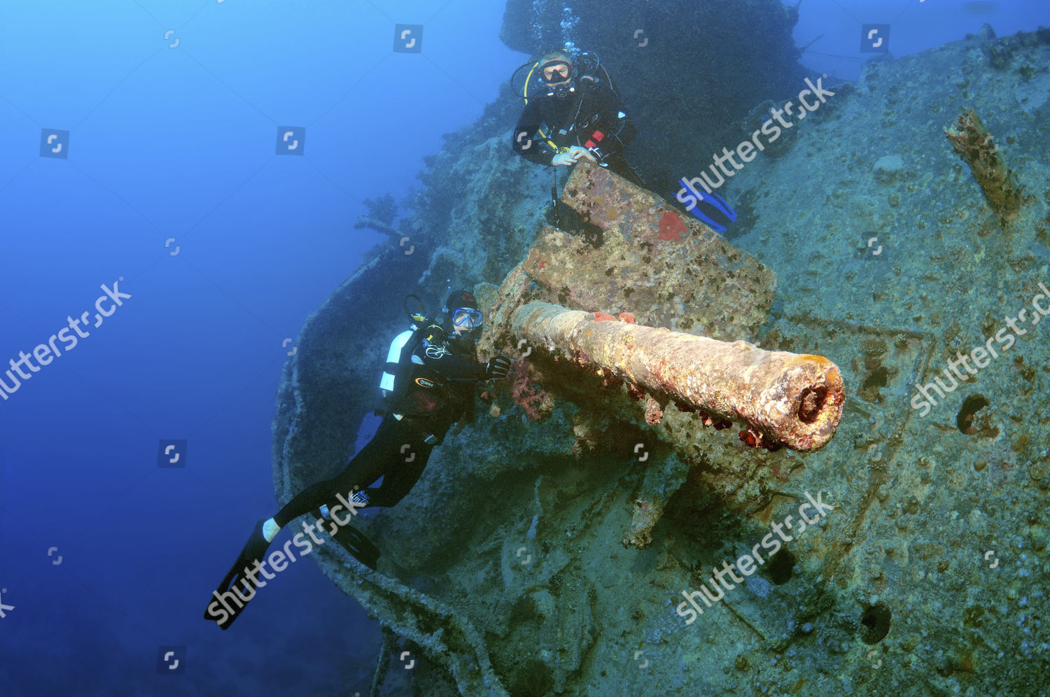 Scuba Divers Looking Antiaircraft Gun On Editorial Stock Photo - Stock ...