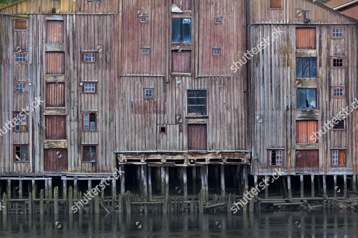 Old Dilapidated Wooden Warehouse On Nidelva Editorial Stock Photo ...