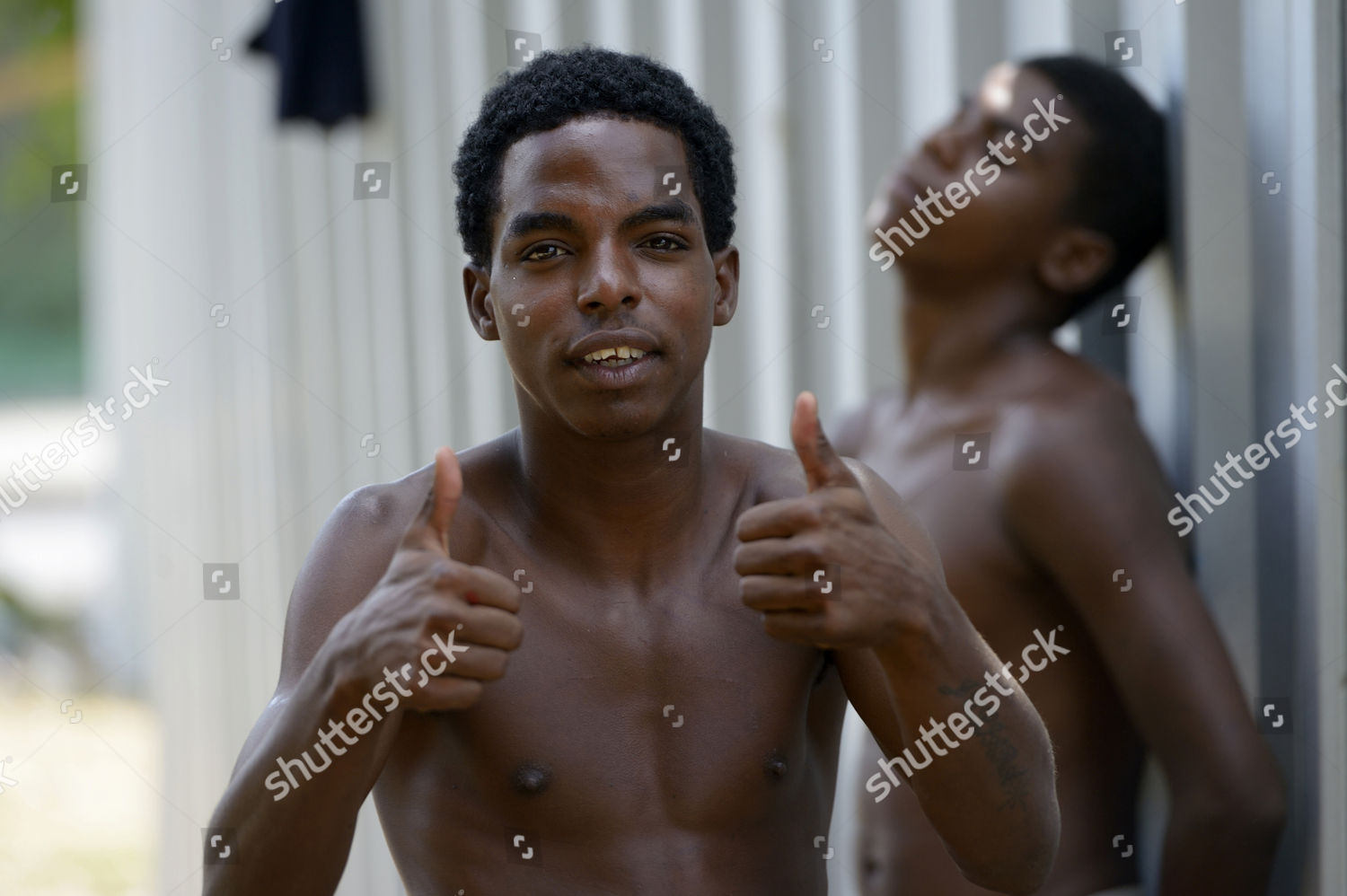 Street Child Youth Making Thumbsup Gesture Editorial Stock Photo street-child-youth-making-thumbsup-gesture-editorial-stock-photo