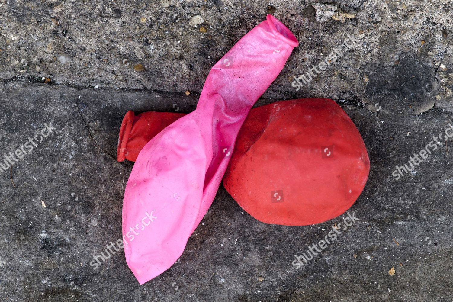 Discarded Balloons On Pavement Editorial Stock Photo - Stock Image ...