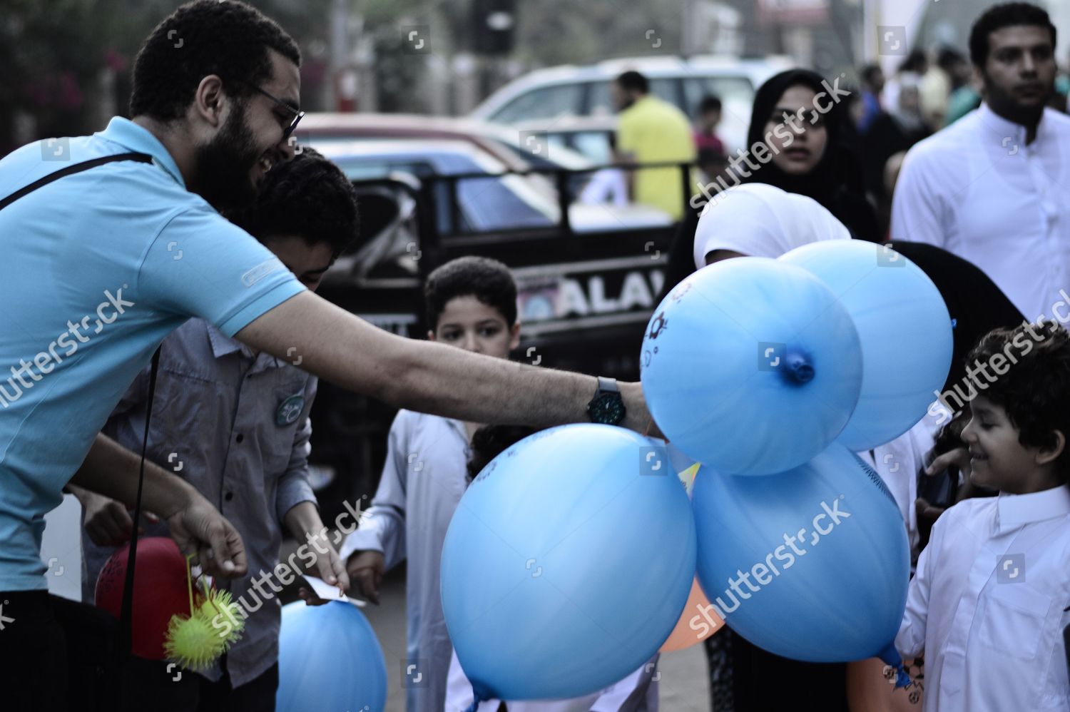 Young Men Give Children Balloons Make Editorial Stock Photo - Stock ...