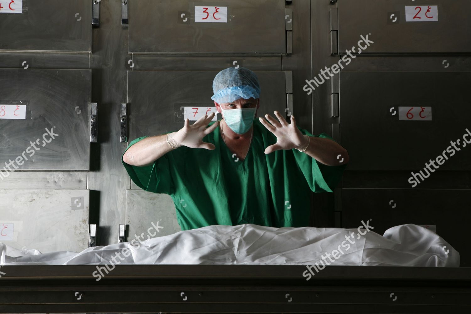 Pathologist Stands Over Corpse Mortuary Editorial Stock Photo - Stock ...