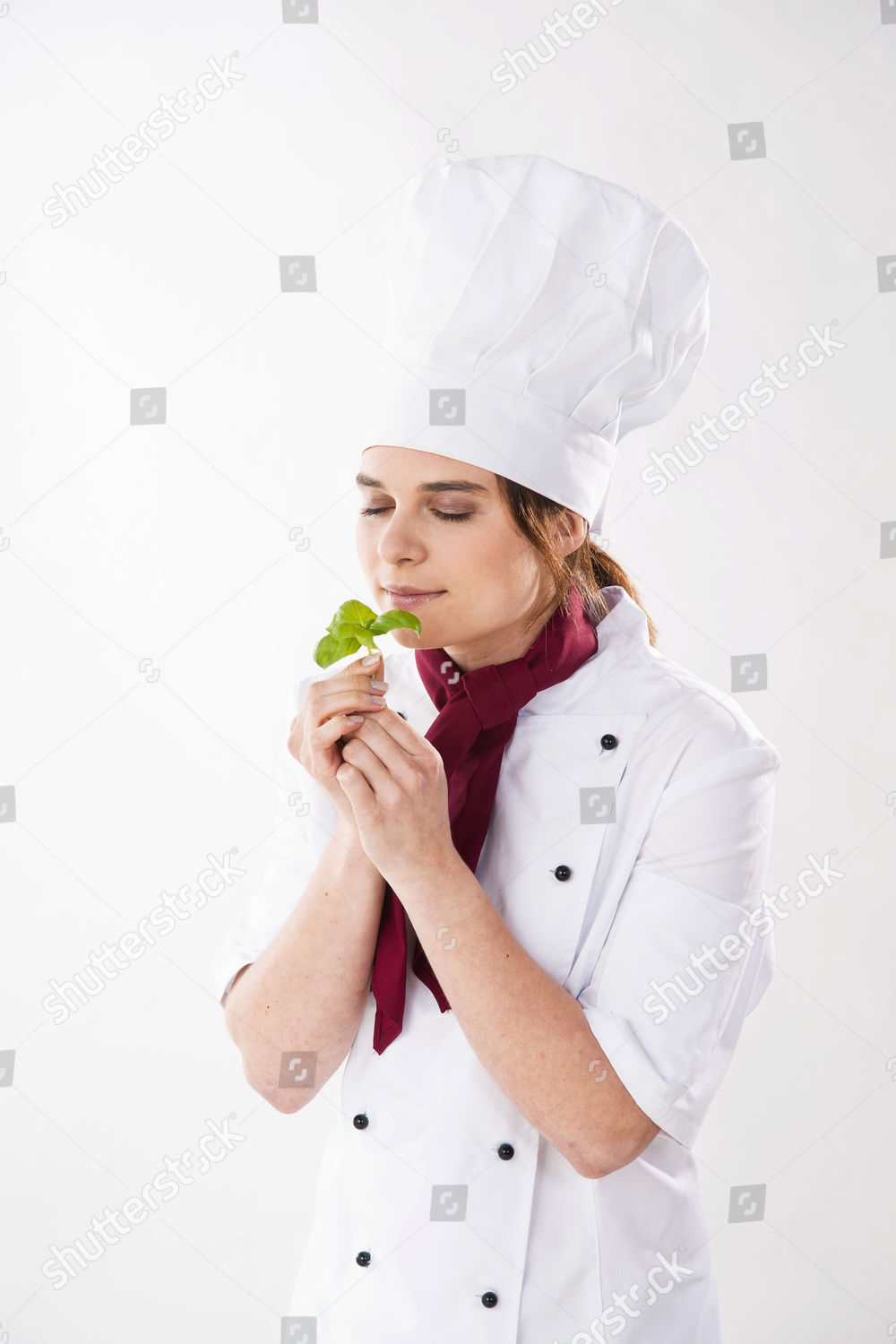 Model Released Young Chef Smelling Basil Editorial Stock Photo - Stock ...