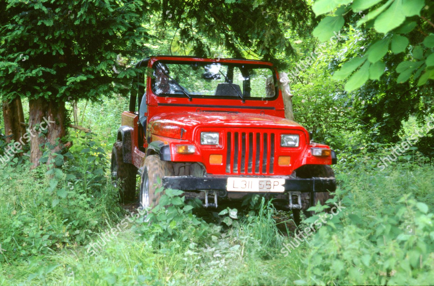 1993 Jeep Wrangler Off Road Forest Editorial Stock Photo - Stock Image ...
