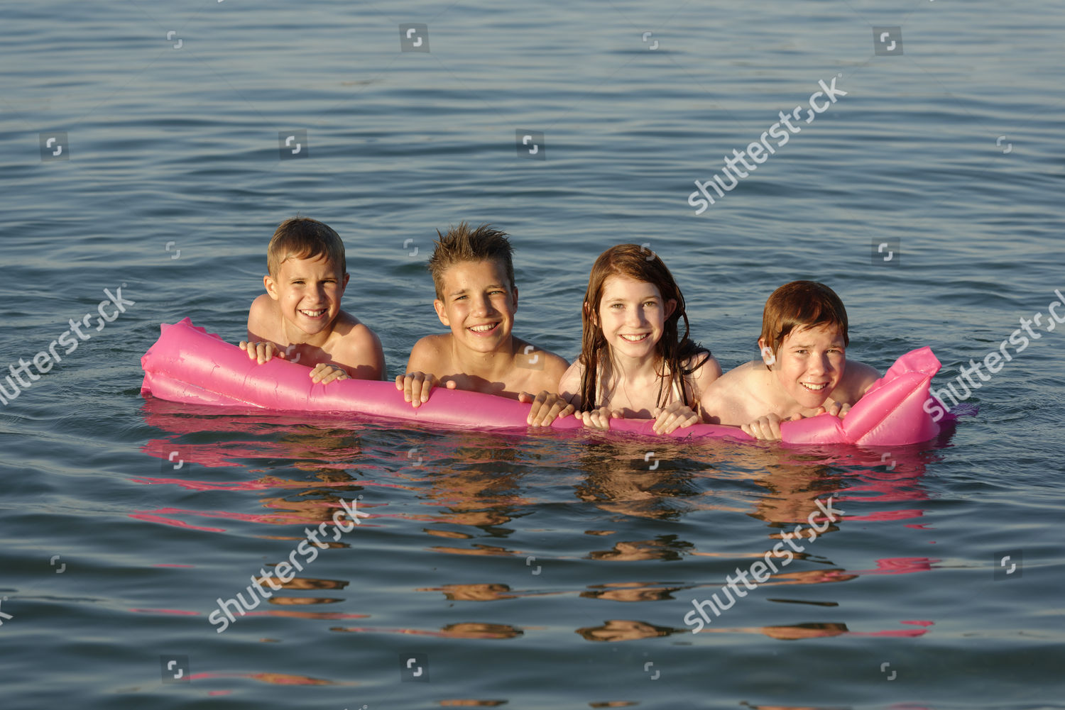 Model Released Children On Lilo Sea - Foto de stock de contenido ...