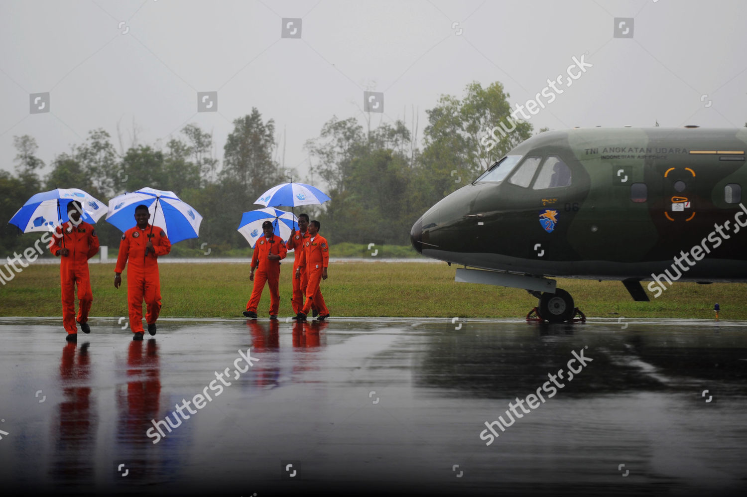 Indonesian Air Force Pilots Hold Umbrellas Editorial Stock Photo ...