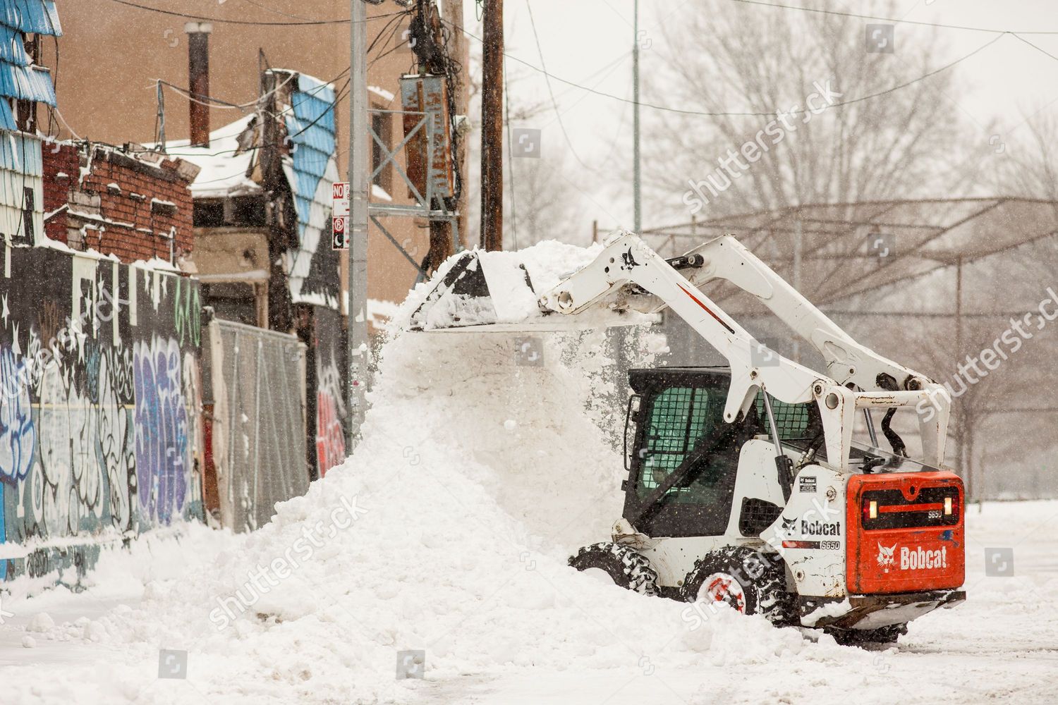 Bobcat Digger Piles Snow Into Mound Editorial Stock Photo - Stock Image ...