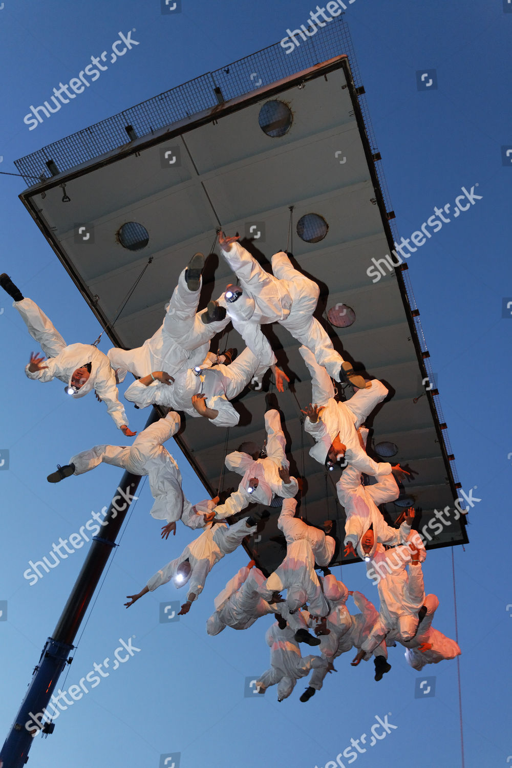 Whiteclad Trapeze Artists Hanging Upside Down Editorial Stock Photo ...