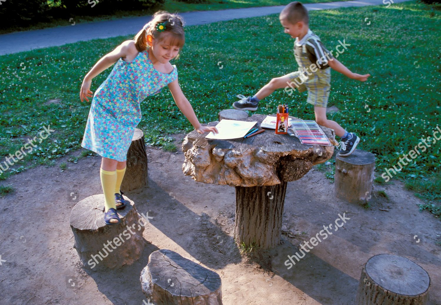Model Released Children Playing On Stumps Editorial Stock Photo - Stock ...