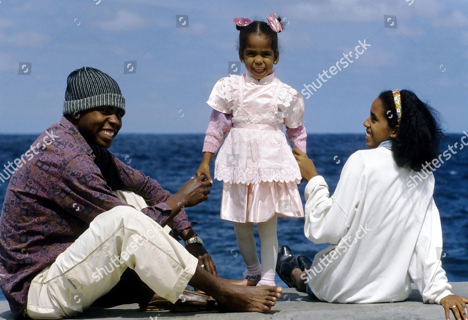 Young Coloured Family Proudly Presenting Their Editorial Stock Photo ...