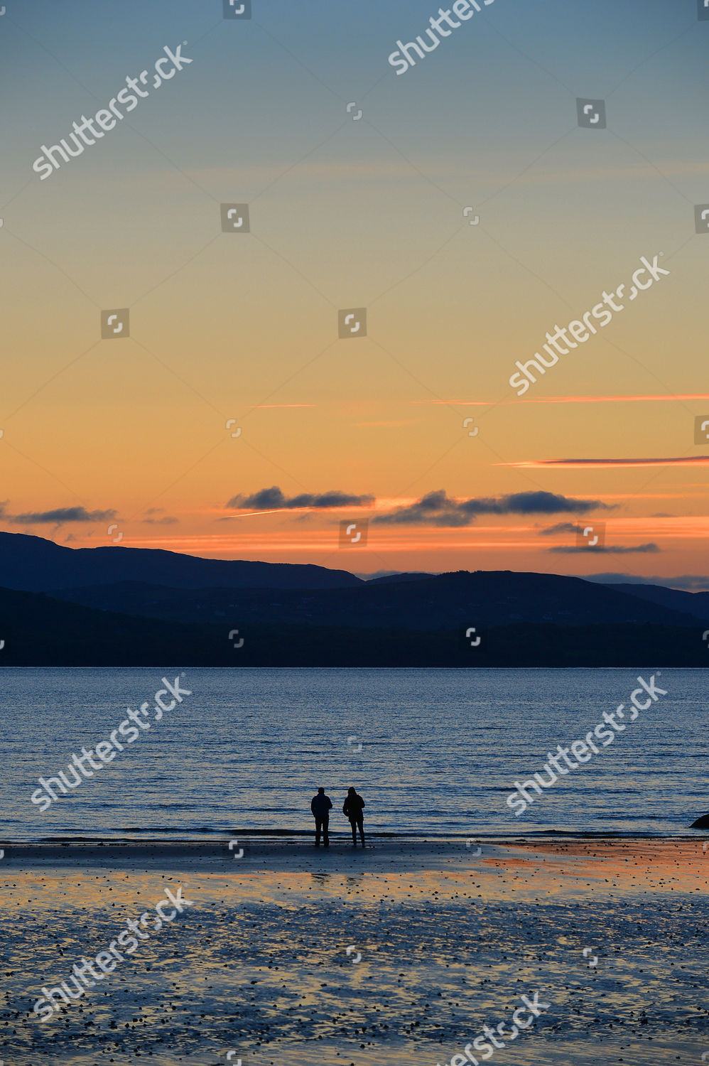 Couple On Fahan Beach Editorial Stock Photo - Stock Image | Shutterstock