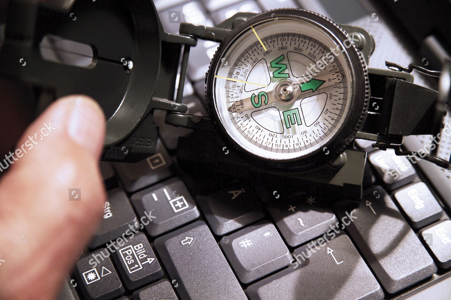 Model Released Compass Keyboard Editorial Stock Photo - Stock Image ...