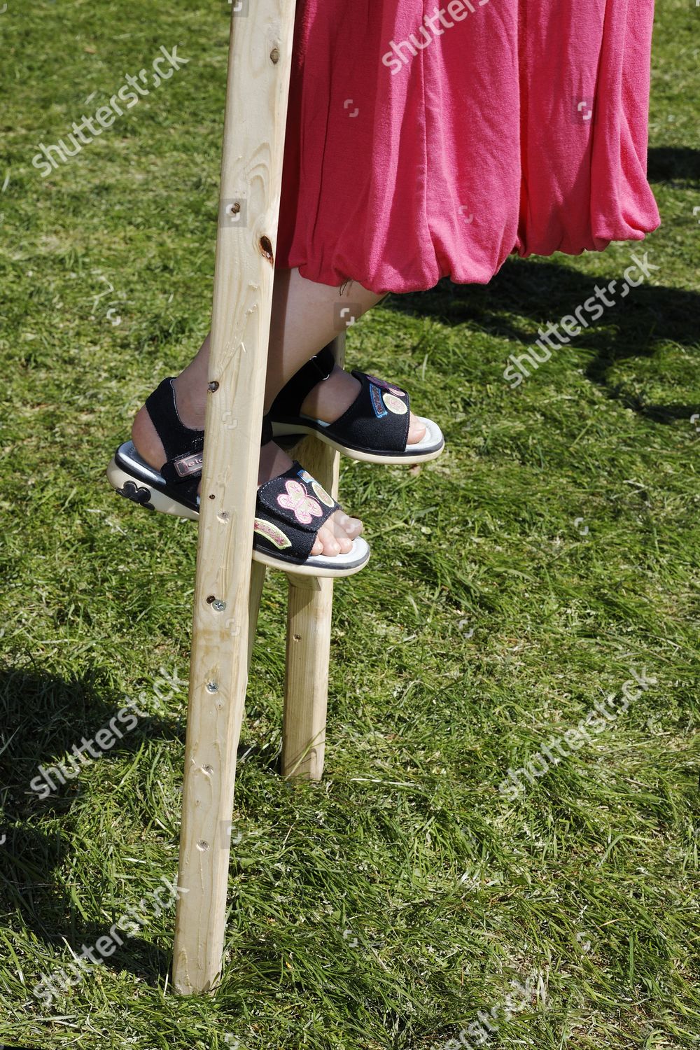 Small Girl Pink Dress On Stilts Editorial Stock Photo - Stock Image ...