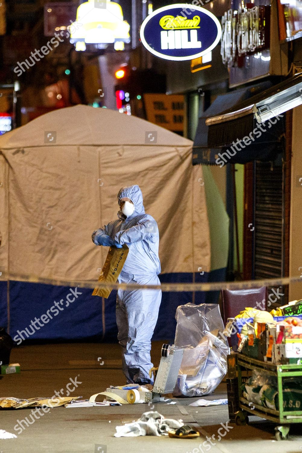 Forensic Officers Investigating Crime Scene On Editorial Stock Photo ...