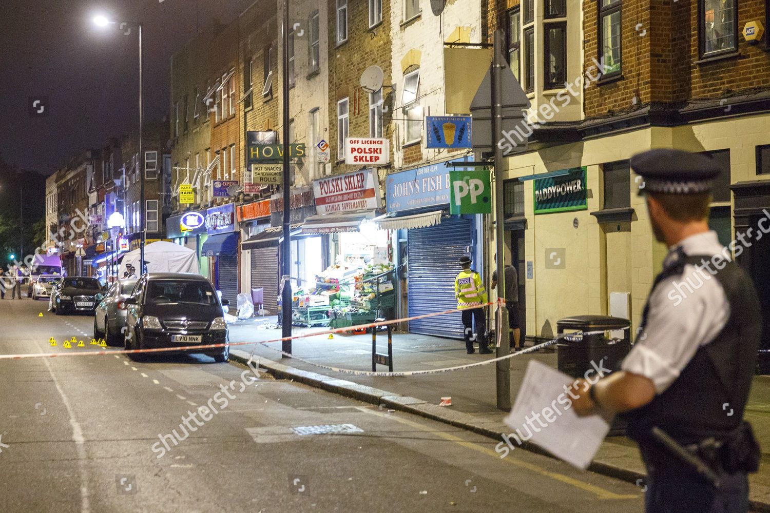 Forensic Officers Investigating Crime Scene On Editorial Stock Photo ...