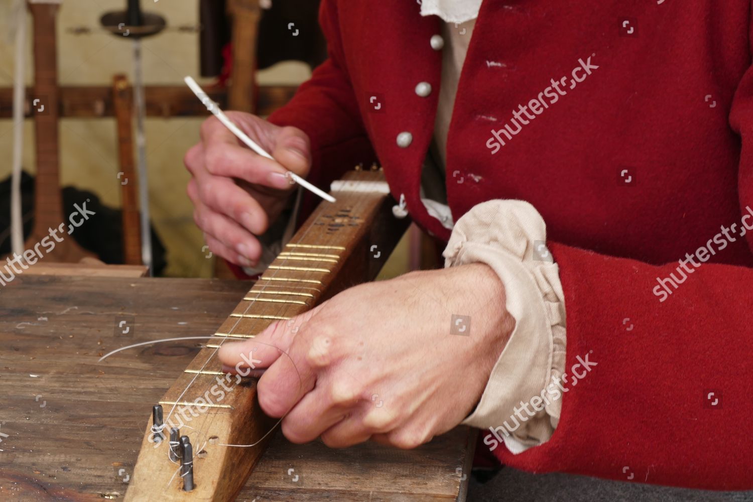ELIZABETHAN MUSICIAN TUNING INSTRUMENT MADE WOODEN Editorial Stock ...