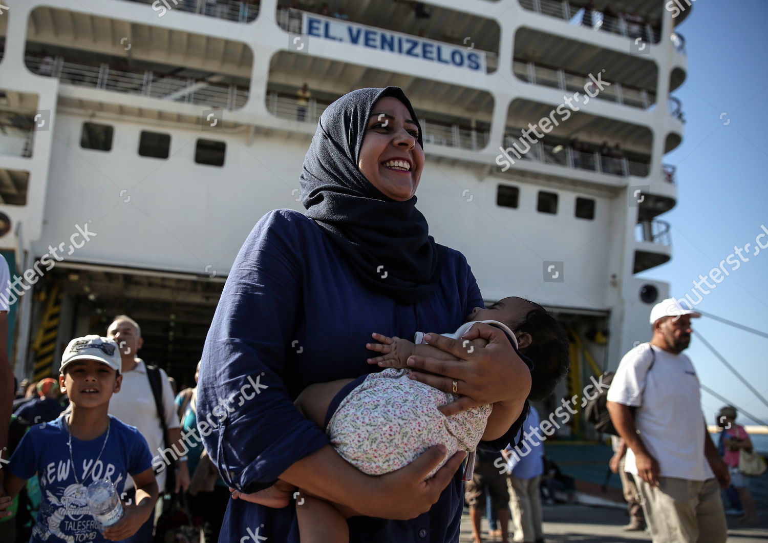Young Mother Clutching Her Baby Editorial Stock Photo - Stock Image ...