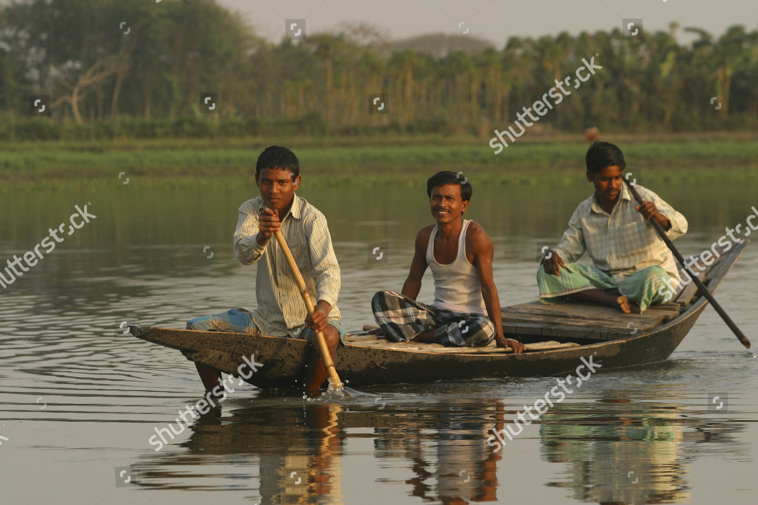 Indian Men Paddling Canoe On River Editorial Stock Photo - Stock Image ...