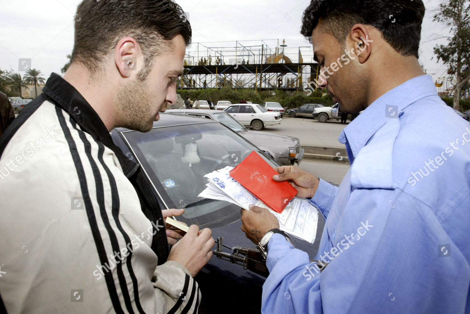 Iraqi Police Officer Checks Id Papers Editorial Stock Photo - Stock ...