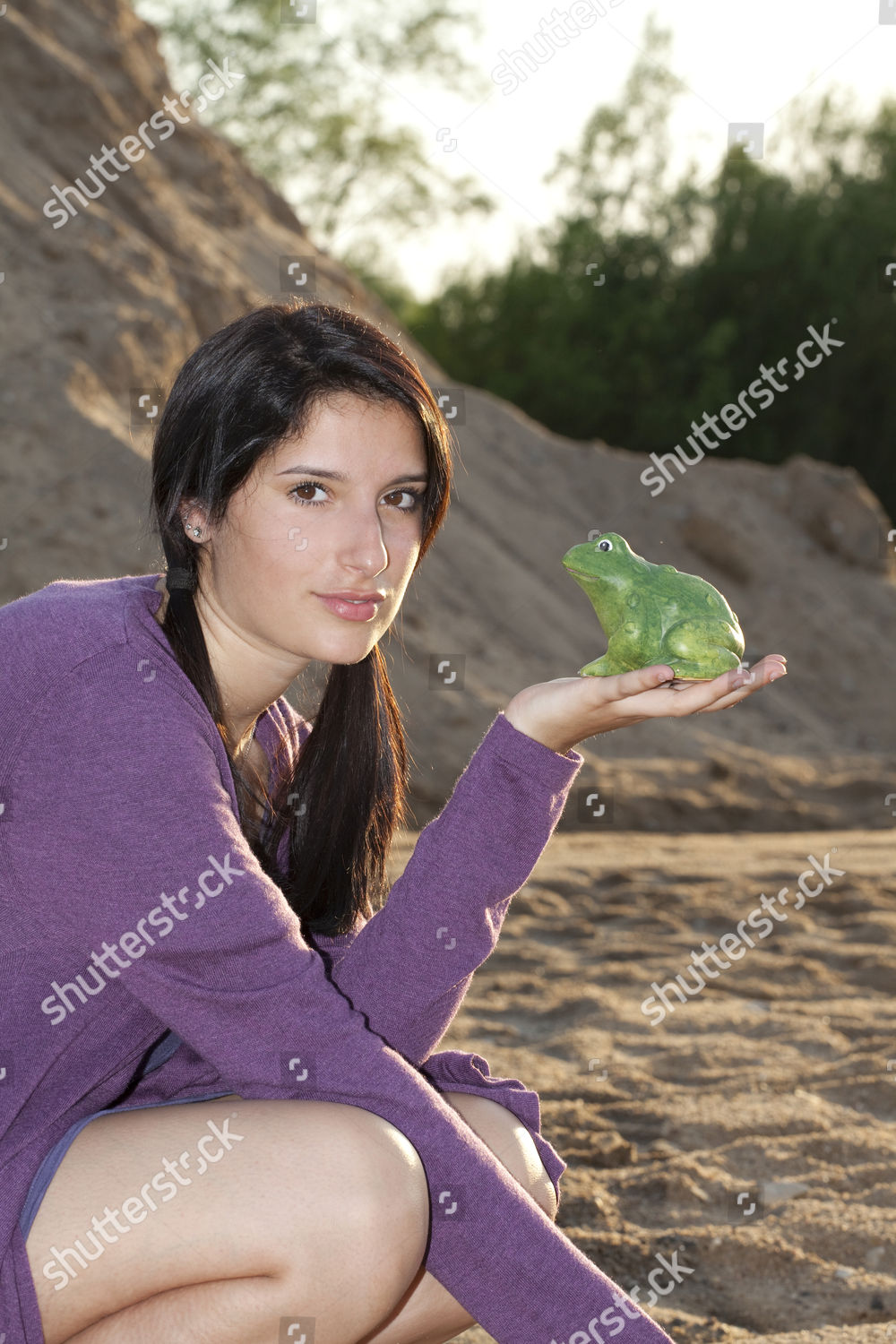 Model Released Young Woman Crouching Holding Editorial Stock Photo ...