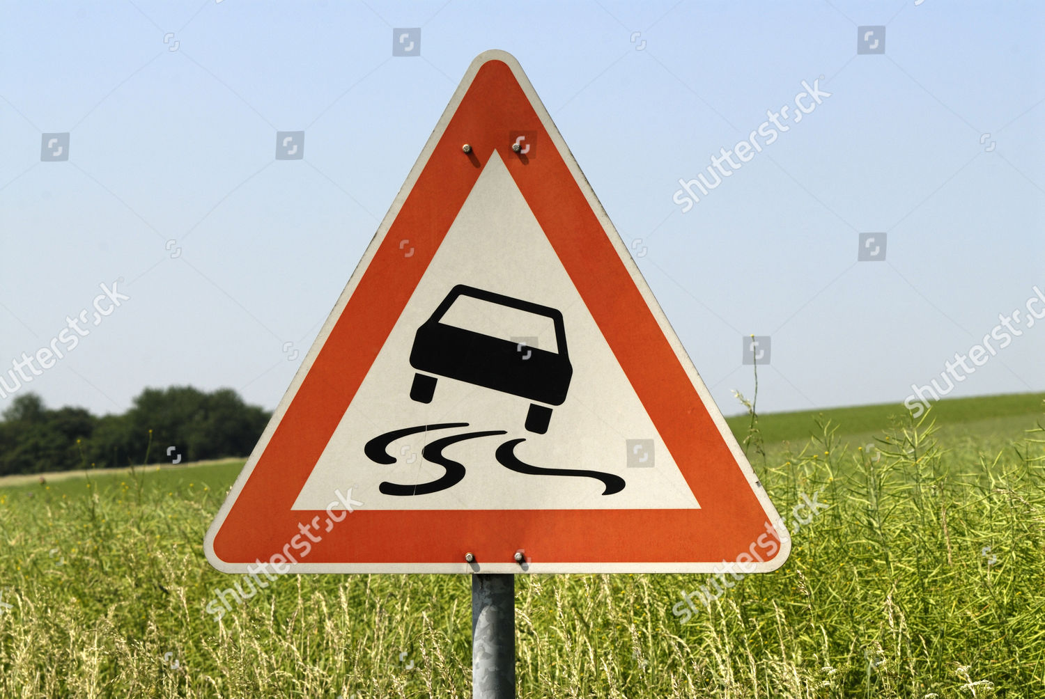 Traffic Sign Slippery When Wet Editorial Stock Photo - Stock Image ...