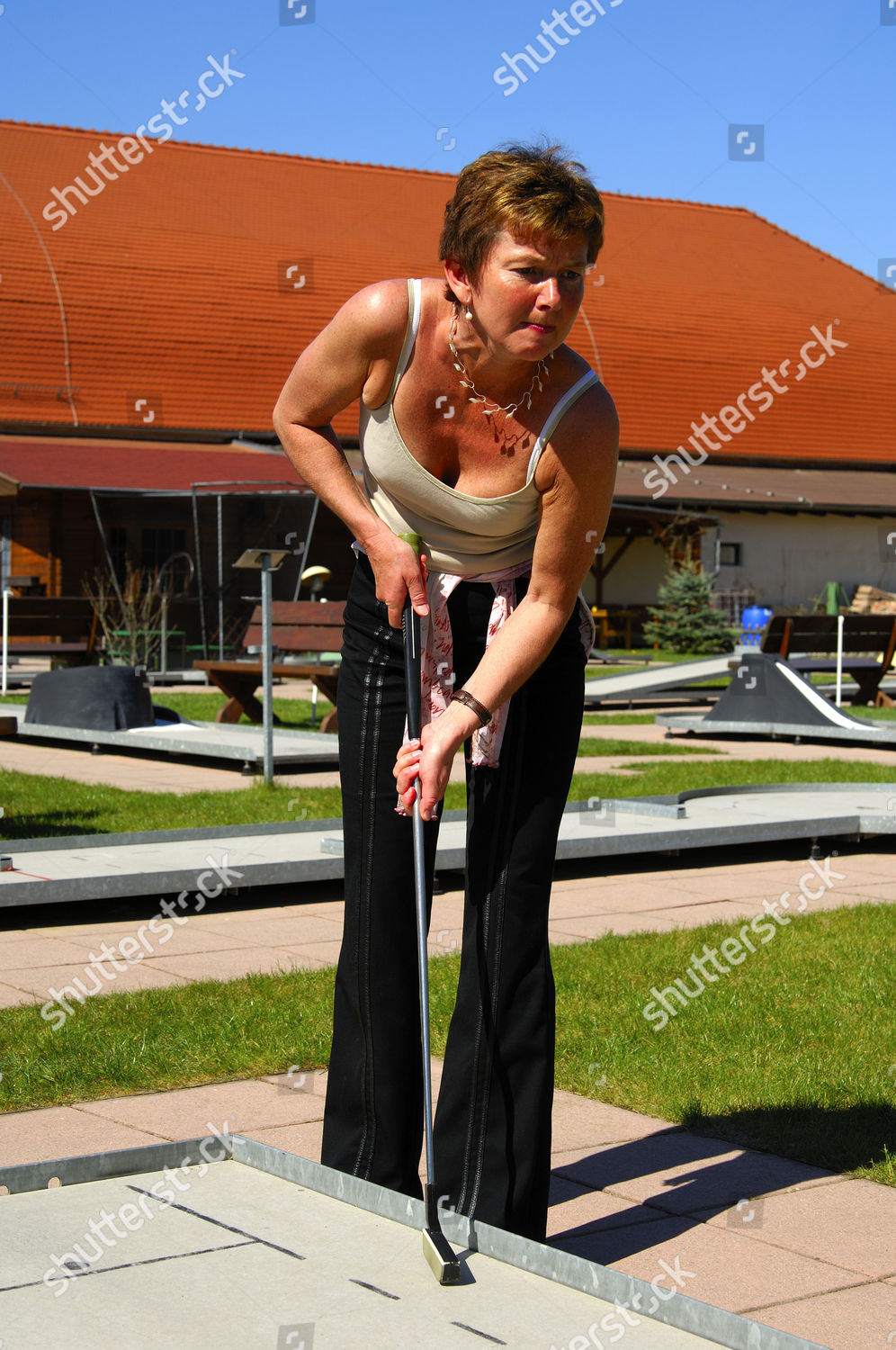 Model Released Young Woman Plays Minigolf Editorial Stock Photo - Stock ...