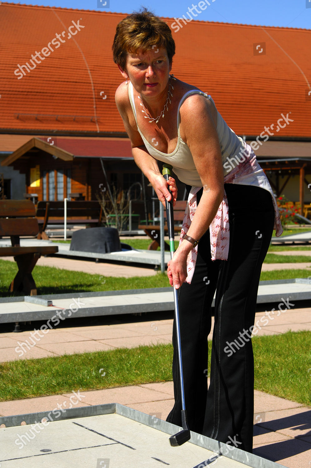 Model Released Young Woman Plays Minigolf Editorial Stock Photo - Stock ...