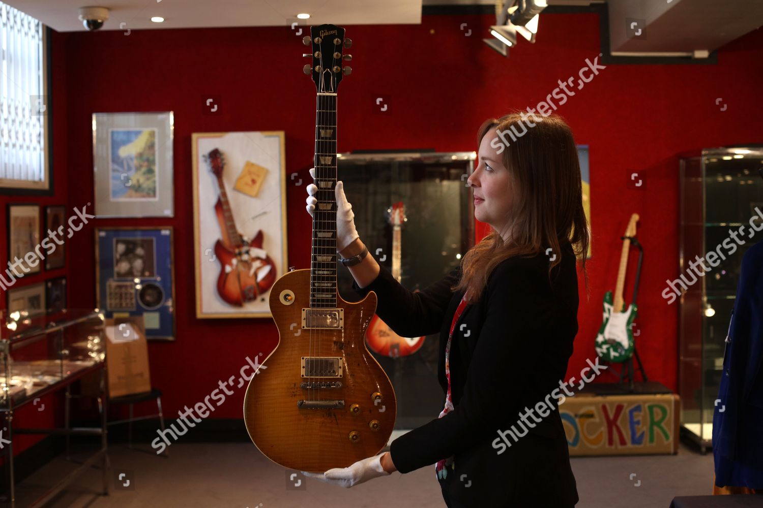 Natalie Downing Bonhams Entertainments Expert Holding Editorial Stock ...