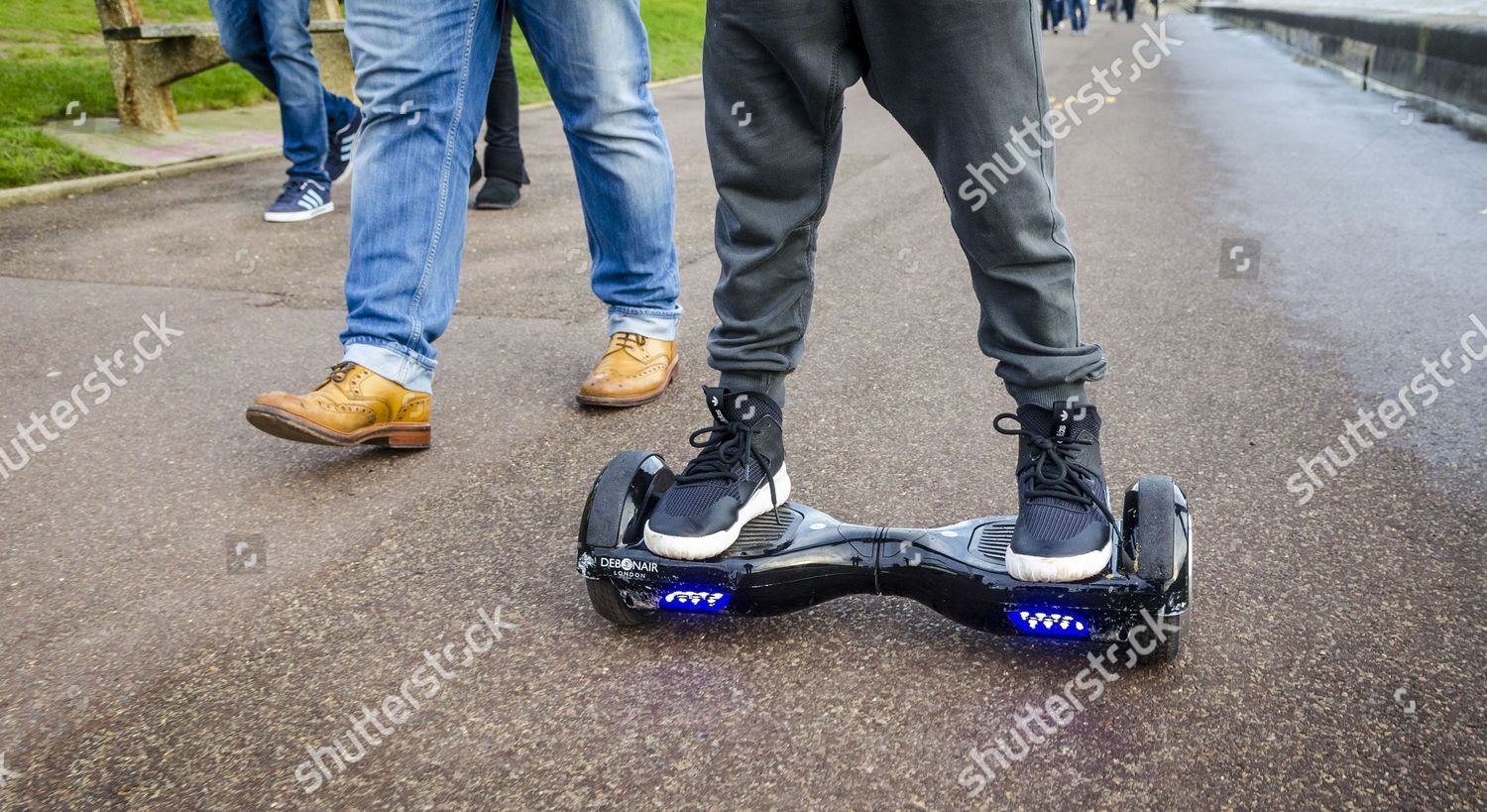Person Riding Hoverboard On Public Footpath Editorial Stock Photo - Stock Image | Shutterstock