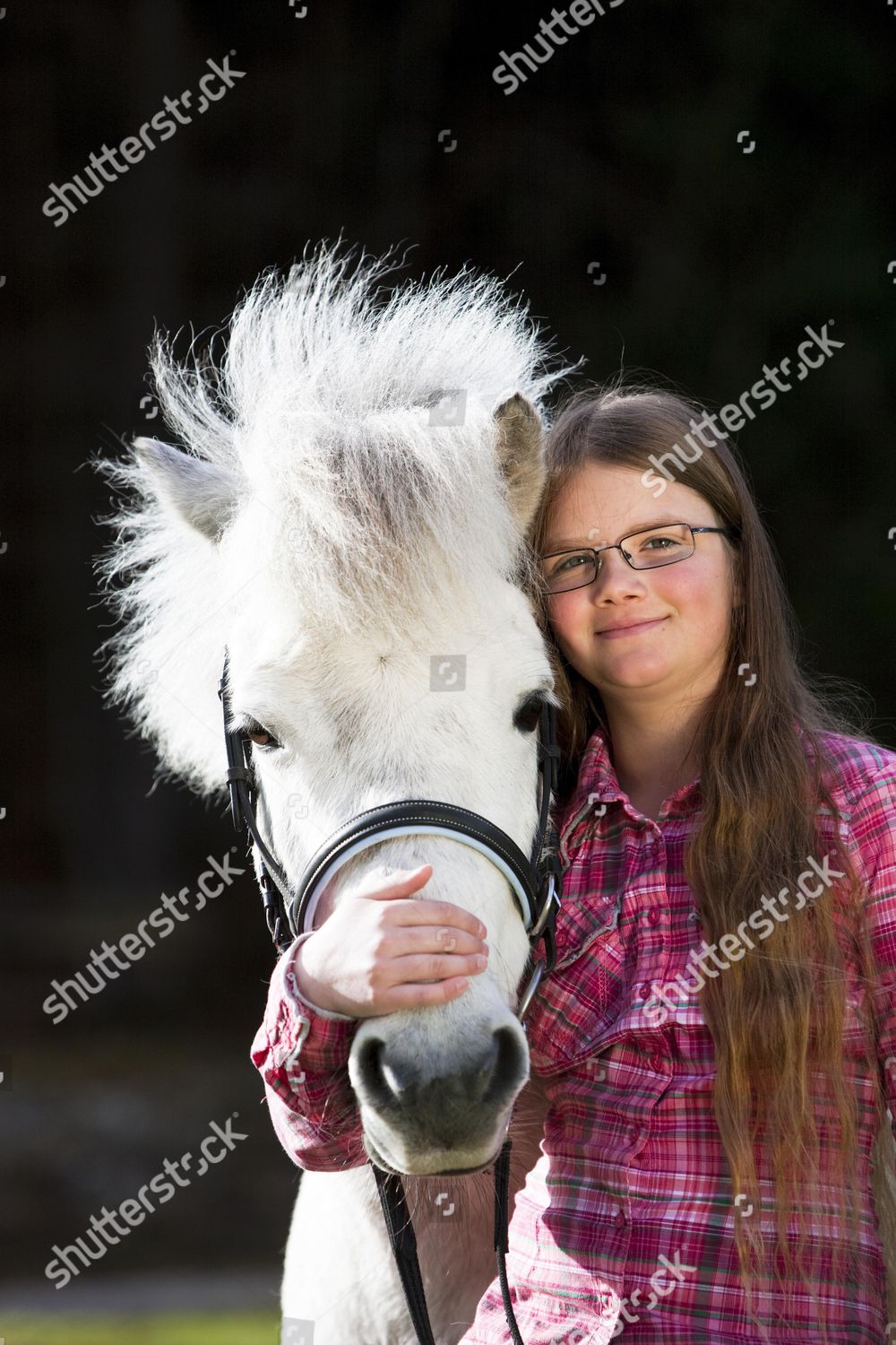 Model Released Girl Cuddling Pony Schimmel Editorial Stock Photo ...