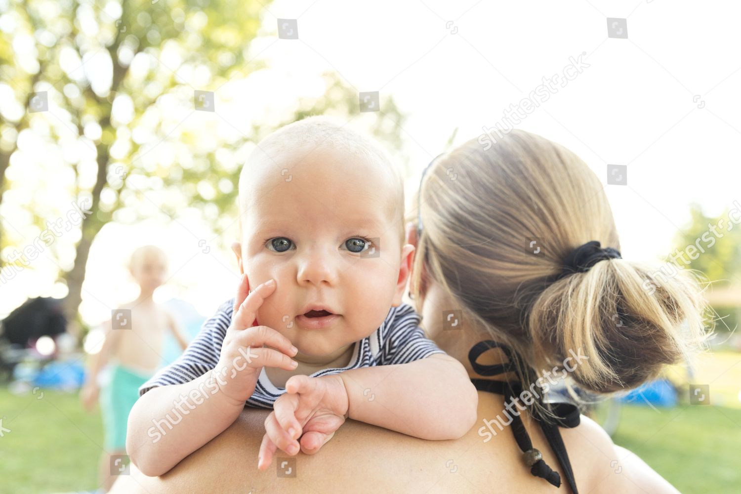 Model Released Baby Looking Over Shoulder Editorial Stock Photo - Stock ...