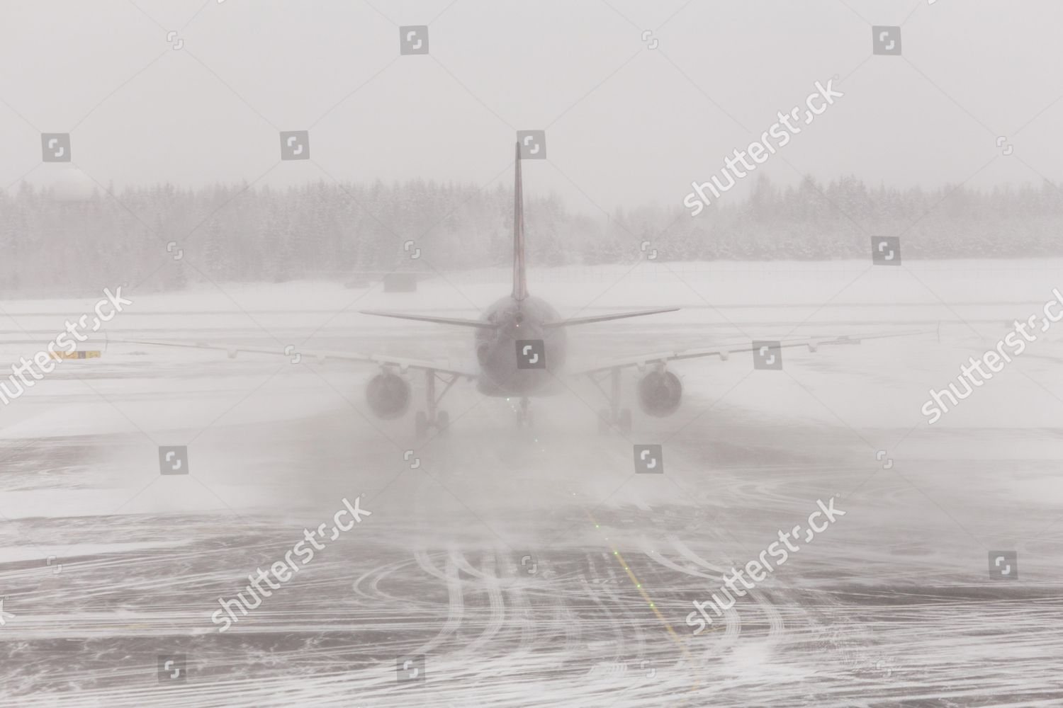 Airplane Bad Weather Snow Storm On Editorial Stock Photo - Stock Image ...