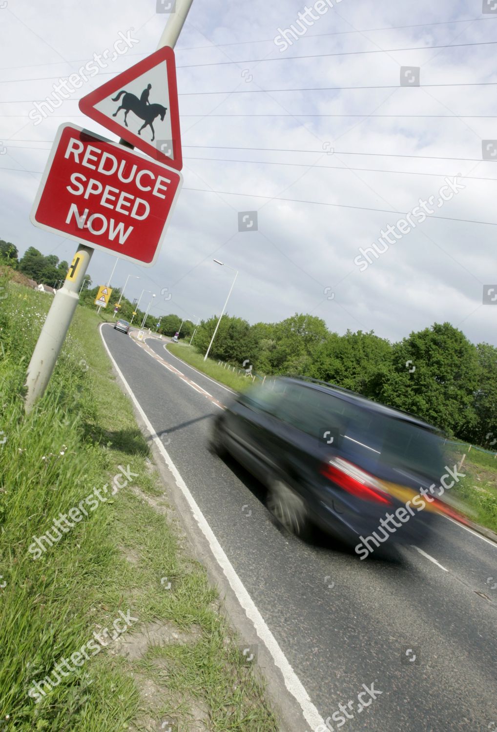 Reduce Speed Now Road Sign Editorial Stock Photo - Stock Image ...