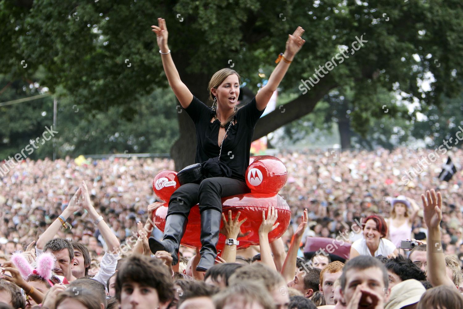 Girl Crowd Surfing On Inflatable Chair Editorial Stock Photo - Stock ...